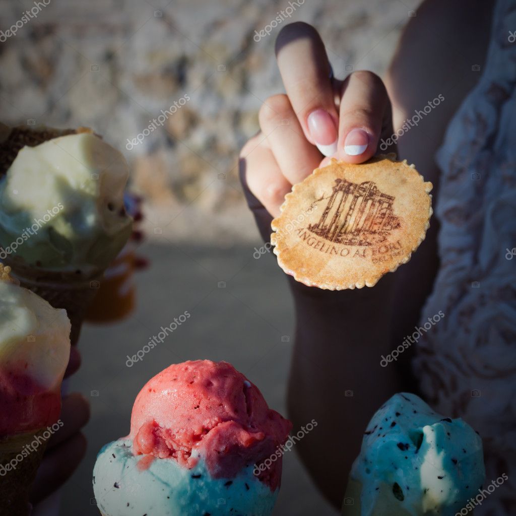 Four horns of ice cream and a round wafer in the hand – Stock Editorial ...