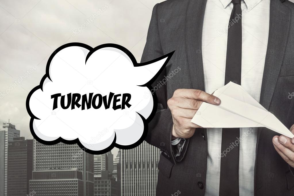 Turnover text on speech bubble with businessman holding paper plane in ...