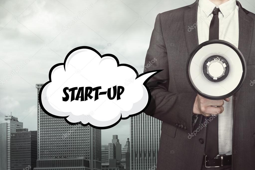 Start-up text on speech bubble with businessman and megaphone — Stock ...