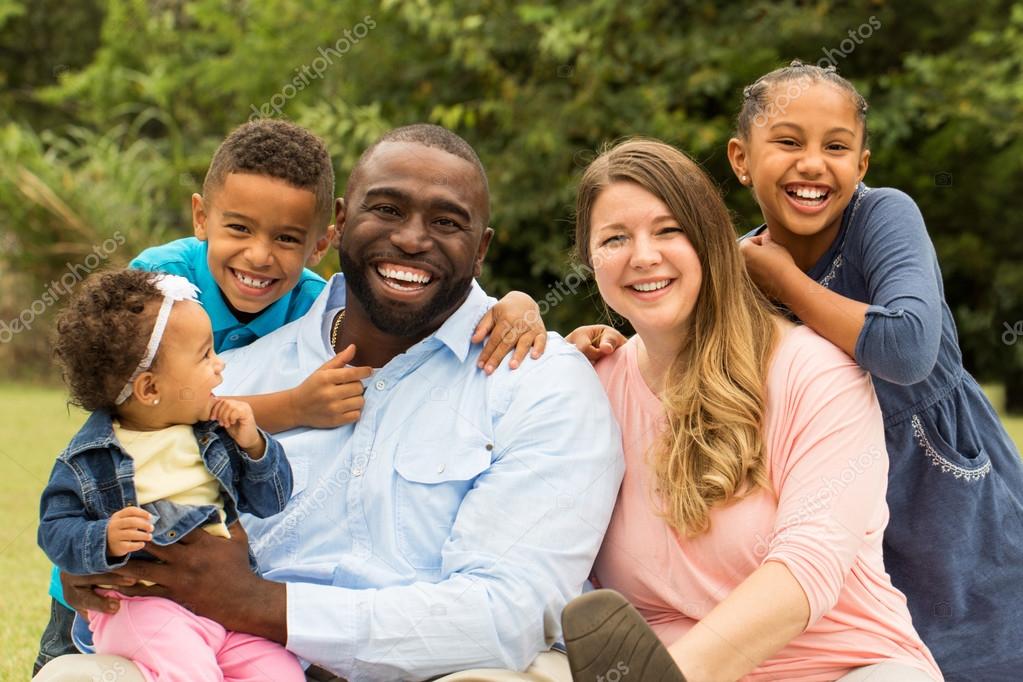 Beautiful diverse family — Stock Photo © pixelheadphoto #85495254 Beautiful diverse family — Stock Photo © pixelheadphoto #85495254