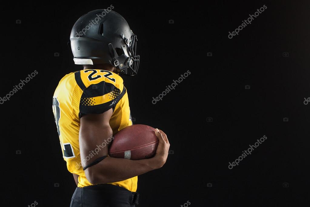 Football player with ball — Stock Photo © pixelheadphoto #93620322