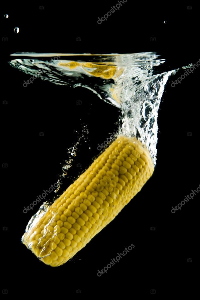 Corn falling in the water Stock Photo by ©raulmellado 103841100