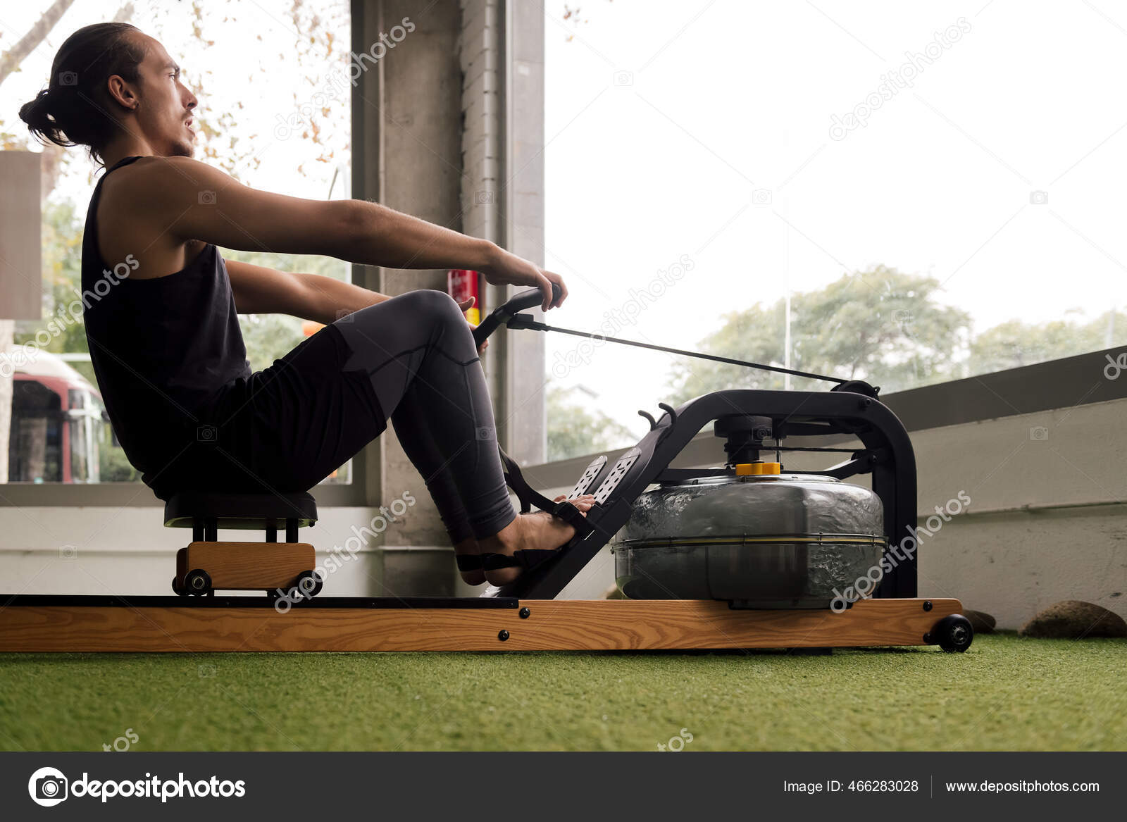 Sporty Man Training His Strength Gym Water Rowing Machine Active Stock ...