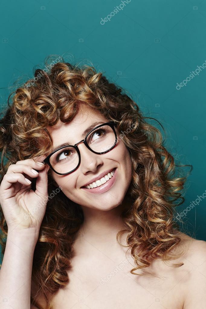 Young woman curly hair — Stock Photo © sanneberg #107904388 Young woman curly hair — Stock Photo © sanneberg #107904388