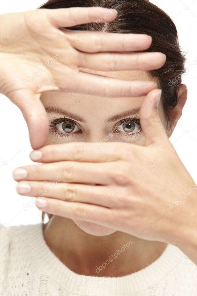 Woman framing her face — Stock Photo © sanneberg #70542659