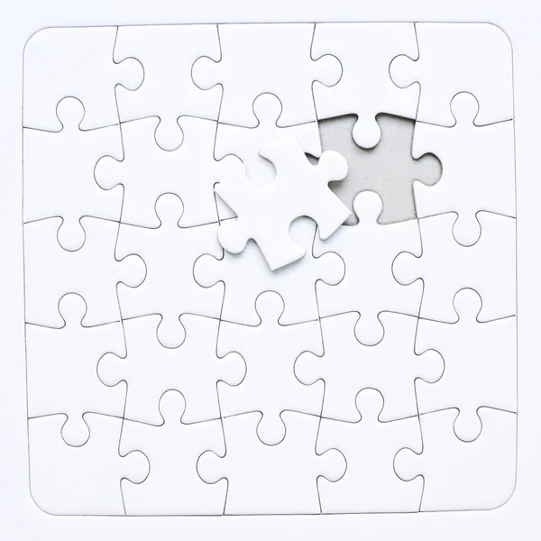 White blank jigsaw isolated on white background Stock Photo by ...