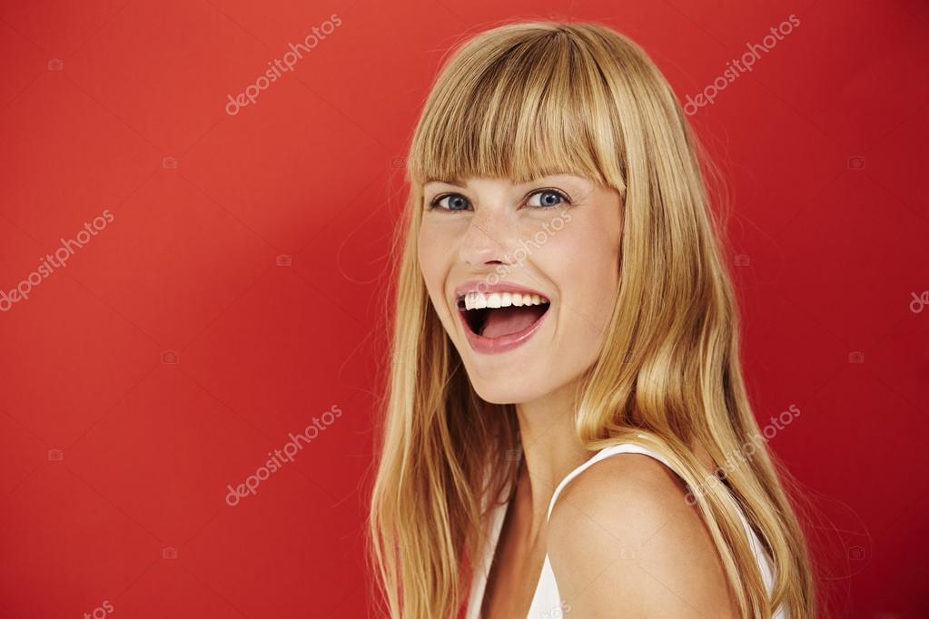 Young woman laughing Stock Photo by ©sanneberg 83700618 Young woman laughing Stock Photo by ©sanneberg 83700618