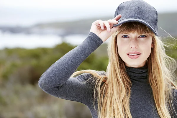 beautiful woman in grey cap - Stock Image - Everypixel