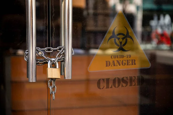 Closed Store due to Coronavirus pandemic. Locked Store Door with ...