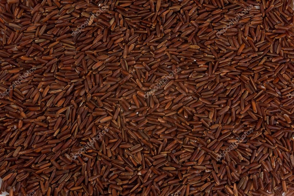 Red rice grain texture background Stock Photo by ©Fesenko 70209293