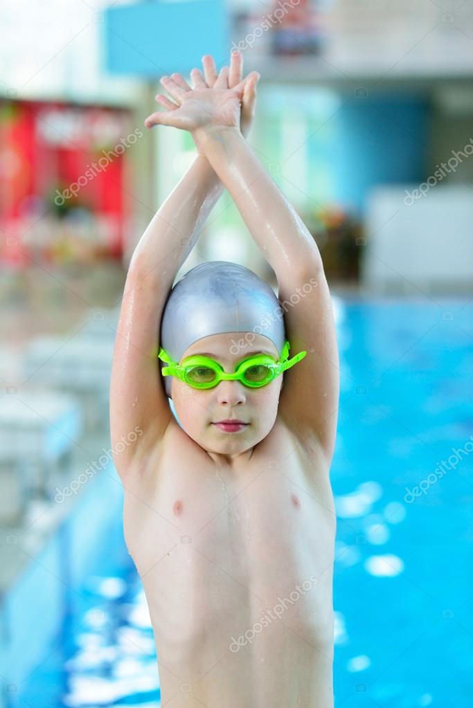 Boy posing in pool — Stock Photo © blicsejo #116875248
