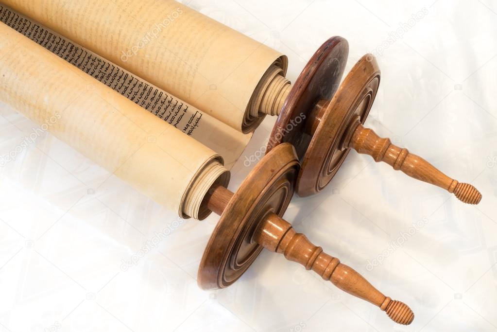 The Hebrew handwritten Torah scroll, on a synagogue alter, illustrating ...