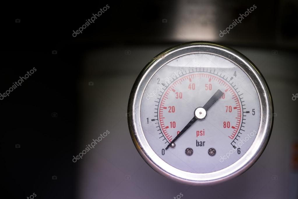 Manometer turbo pressure meter gauge in pipes oil plant with liquid ...