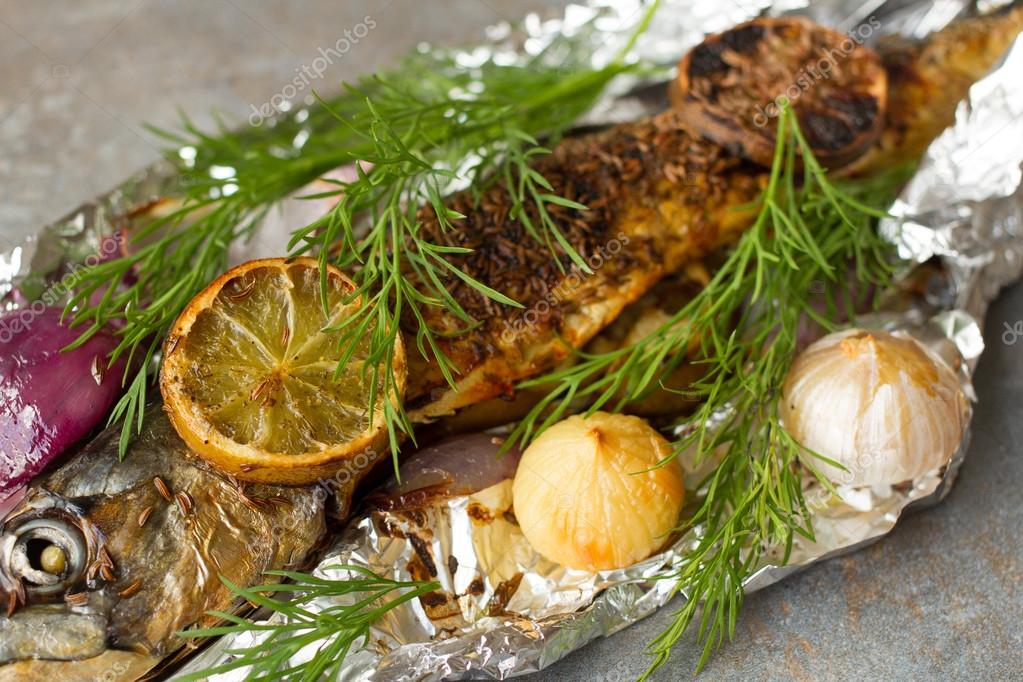Falgu fish with lime garlic and onion — Stock Photo © Naltik #69404315