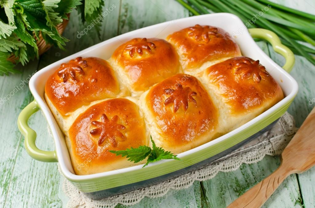 Yeast buns with a filling of cottage cheese and nettle Stock Photo by ...