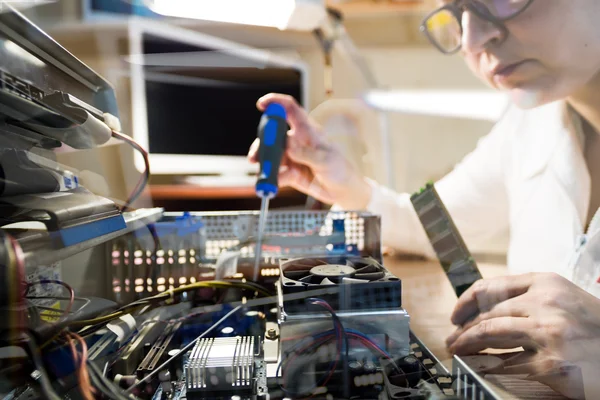 Computer Technician repairing Hardware throw the window image Stock ...