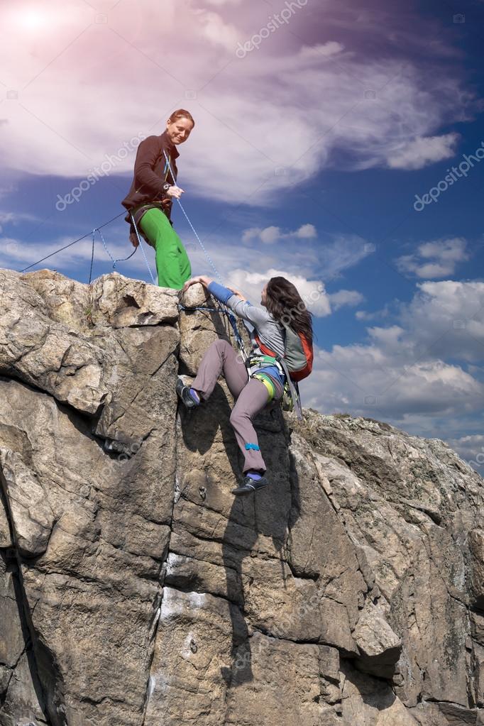Climbers teamwork — Stock Photo © AlexBrylov #77066203