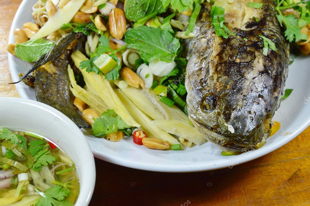 Deep fried snake head fish with mixed herb dipping sweet sauce ⬇ Stock ...