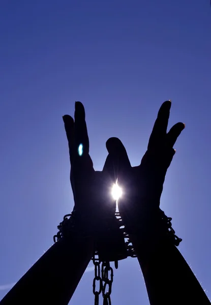 Hands in chains — Stock Photo © mikelo001 #63413219
