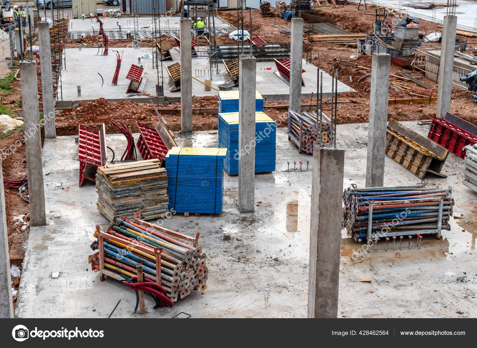Construction site with reinforced concrete columns, struts and ...
