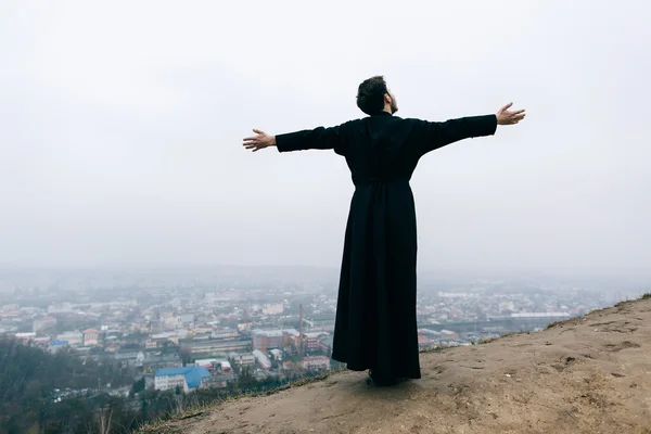 Portrait of handsome catholic bearded priest Stock Photo by ©beorm ...