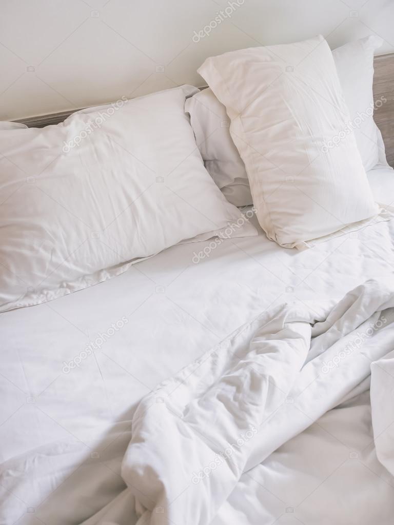 Messed up Bed and Pillow in bedroom — Stock Photo © viteethumb #75511435