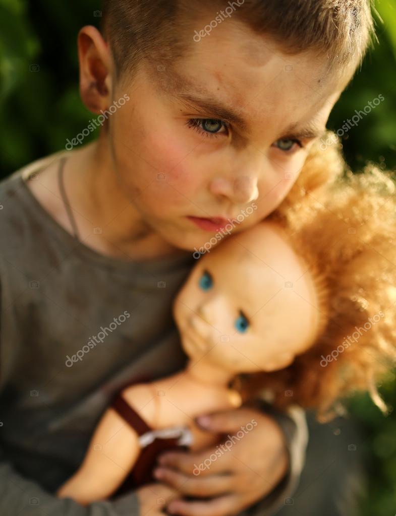 Alone sad child on a street Stock Photo by ©aleksey_rezin 79832250