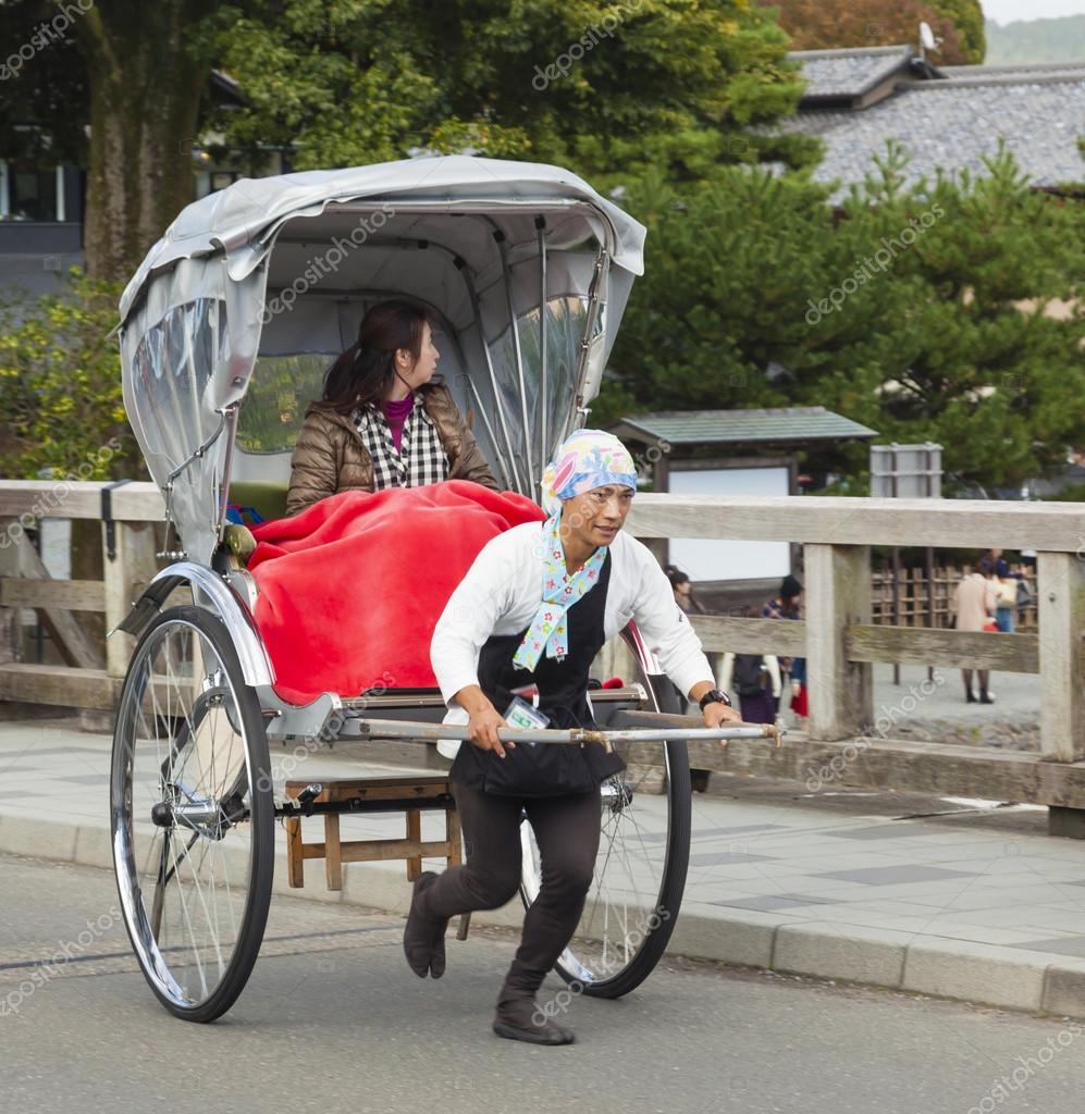 Tourist riding a rickshaw in Kyoto, Japan – Stock Editorial Photo ...
