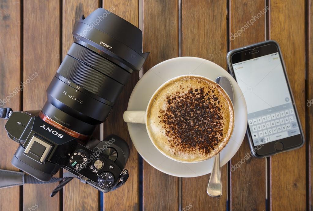 Coffee, smartphone and camera — Stock Editorial Photo © ymgerman #86469878
