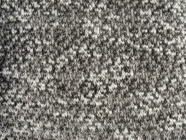 Close up black and white knitted fabric texture. Cloth background ...