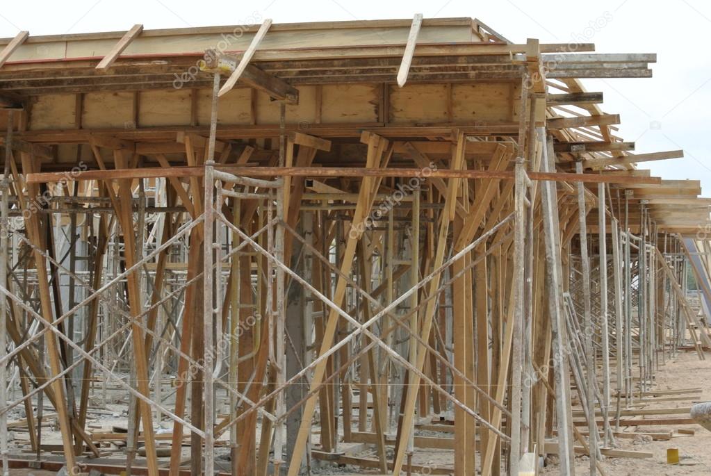 Timber beam formwork supported by row of scaffolding — Stock Photo ...