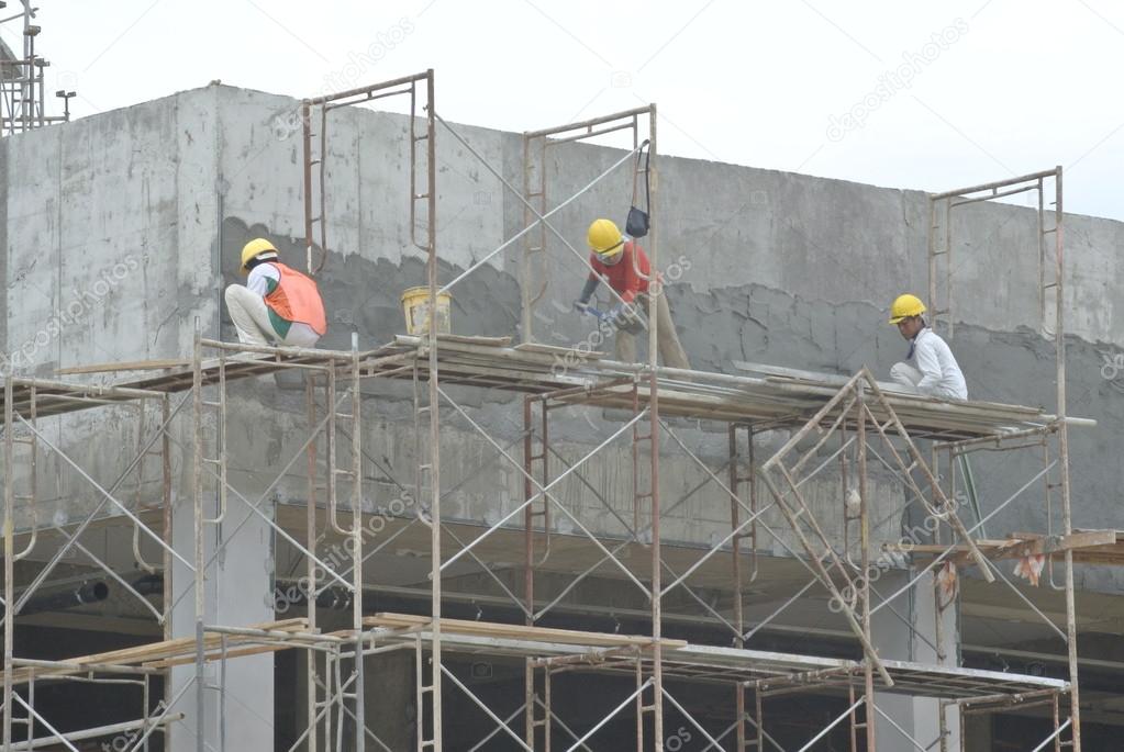 Plastering work by construction workers – Stock Editorial Photo ...