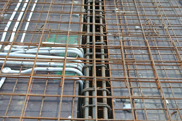 Reinforcement bar fabricated and tied using wire at construction site ...