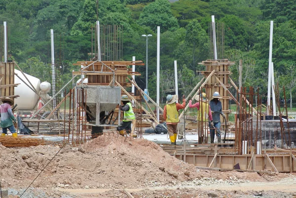 Group of construction workers casting for ground floor slab — Stock ...