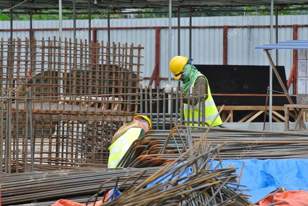 Construction workers working at Steel bar bending yard — Stock Photo ...