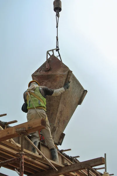 Group of construction workers casting beam ⬇ Stock Photo, Image by ...