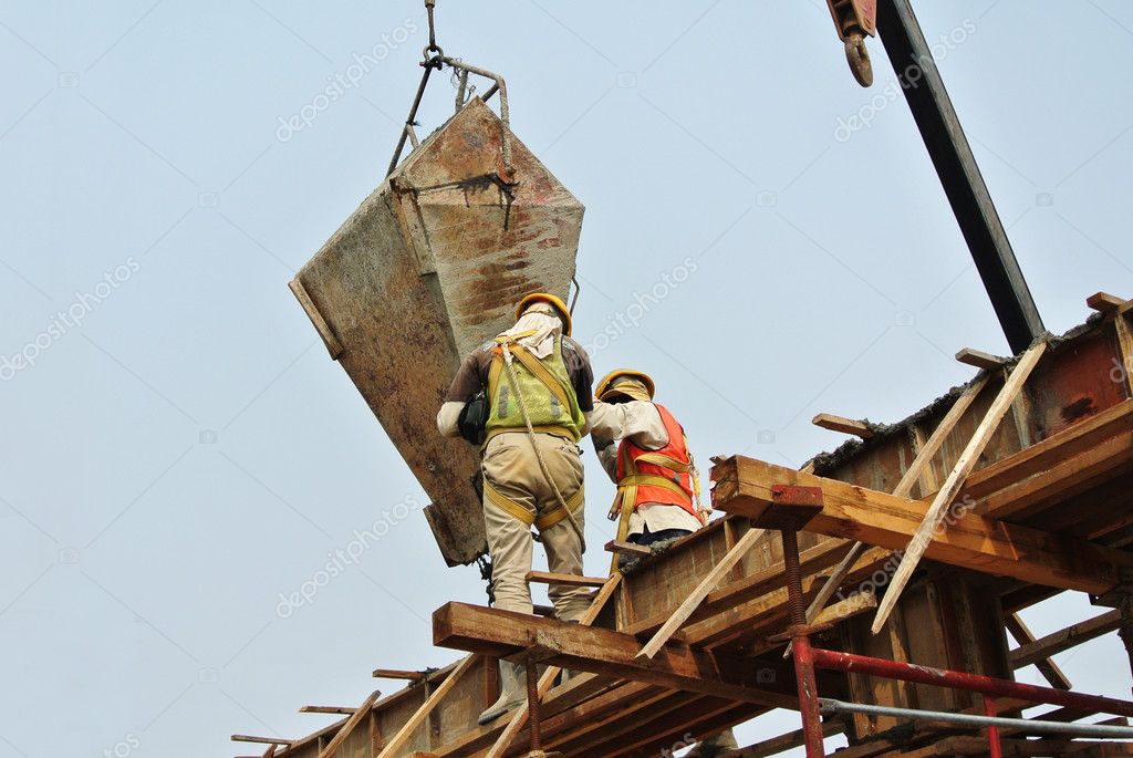 Group of construction workers casting beam ⬇ Stock Photo, Image by ...