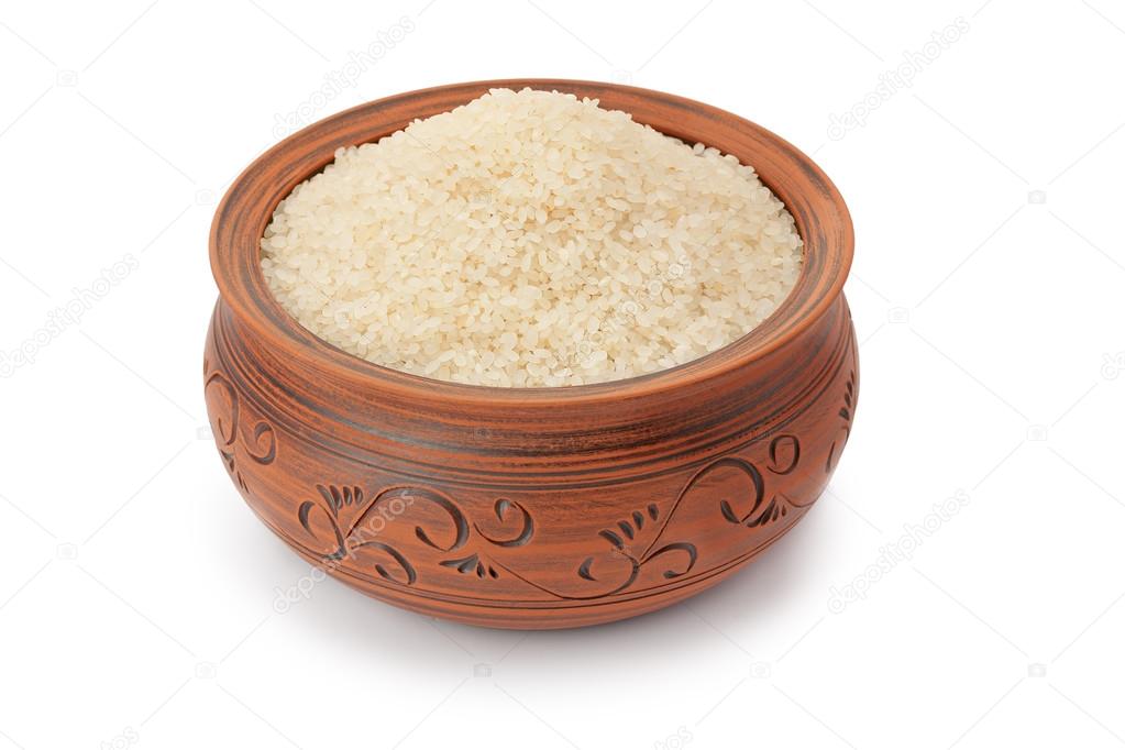 Clay pot filled with rice — Stock Photo © kuzina1964 #66475527