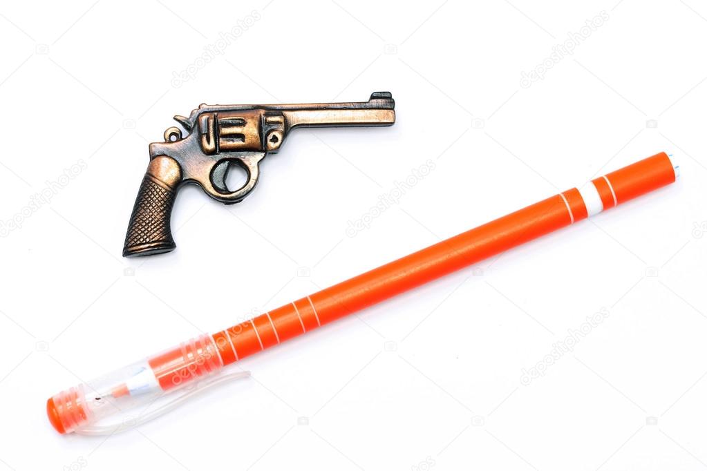 Toy gun and pen Stock Photo by ©snowwhiteimages 80863472