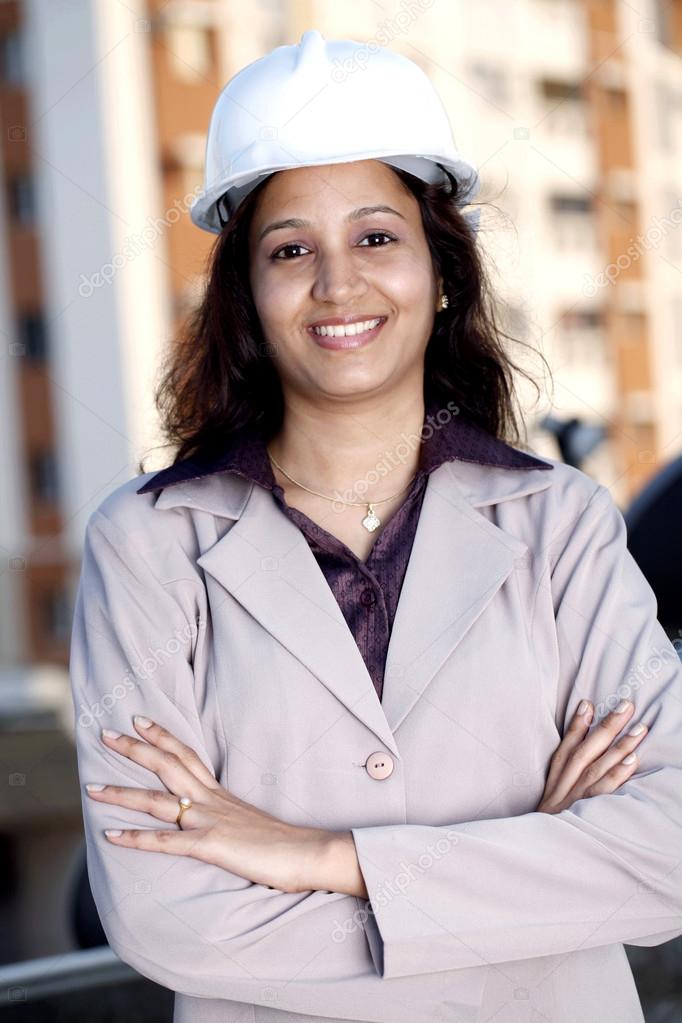 Arms crossed female construction engineer — Stock Photo © snowwhiteimages #81025386