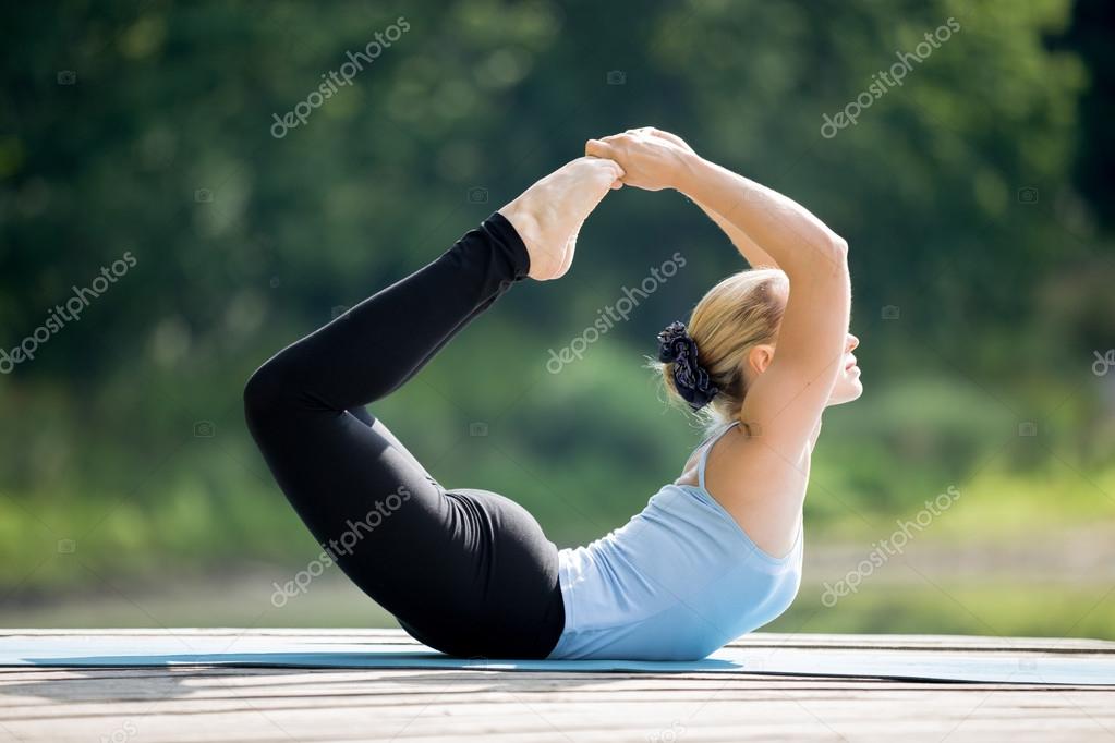 Big Toe Bow Pose Stock Photo by ©fizkes 82053770