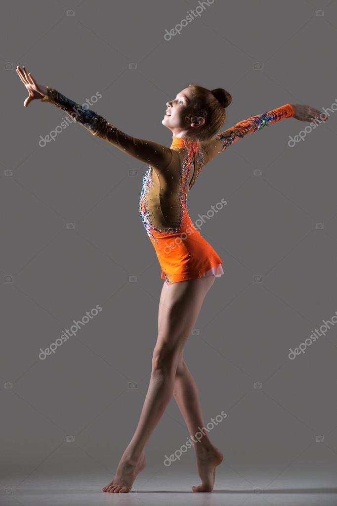 Smiling gymnast girl dancing — Stock Photo © fizkes #96217424