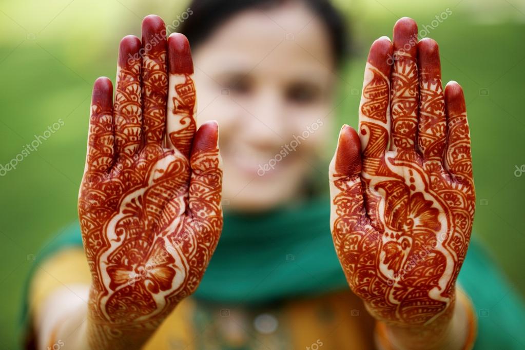 Beautiful hand with henna design — Stock Photo © Qpicimages #61420011