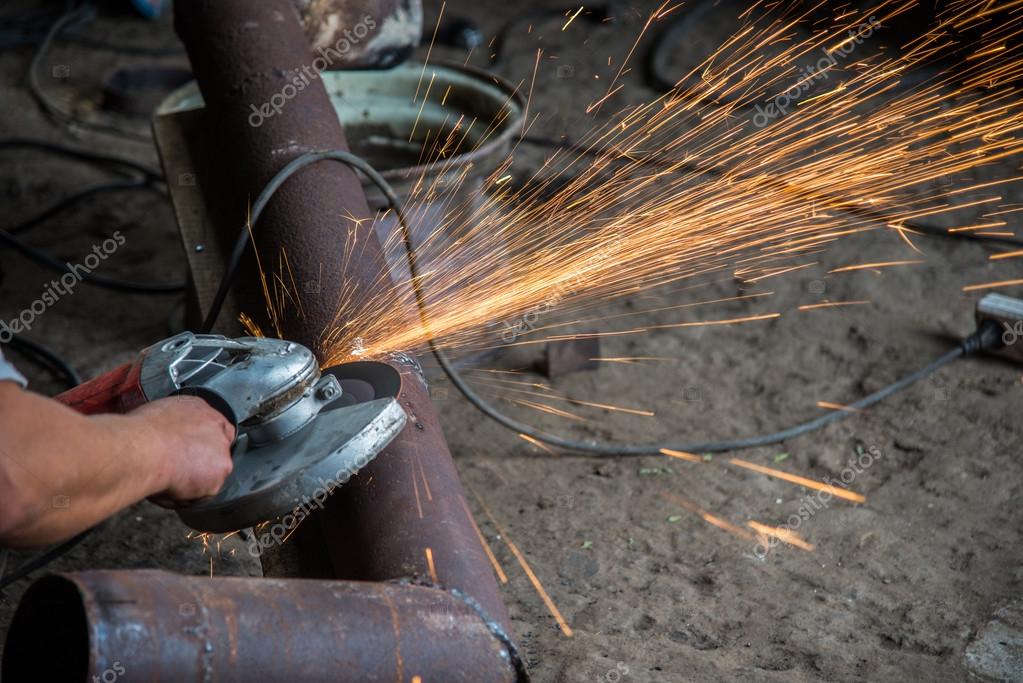 Locksmith's workshop. Angle grinder. — Stock Photo © liukov #87929240