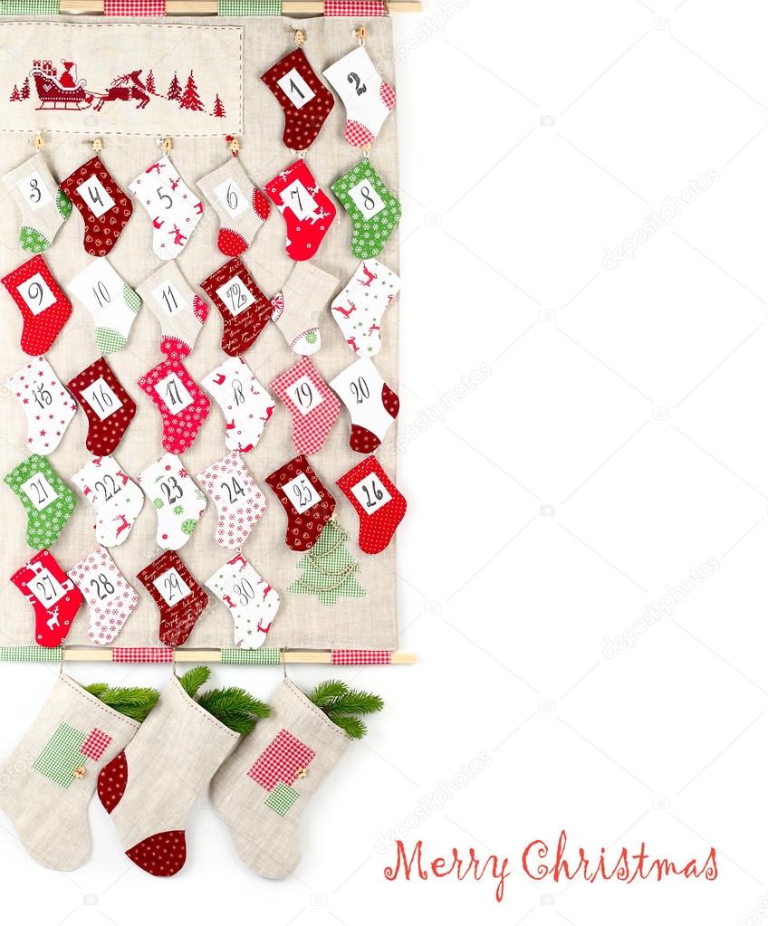 Christmas textile calendar with multi-colored socks. A Christmas ...