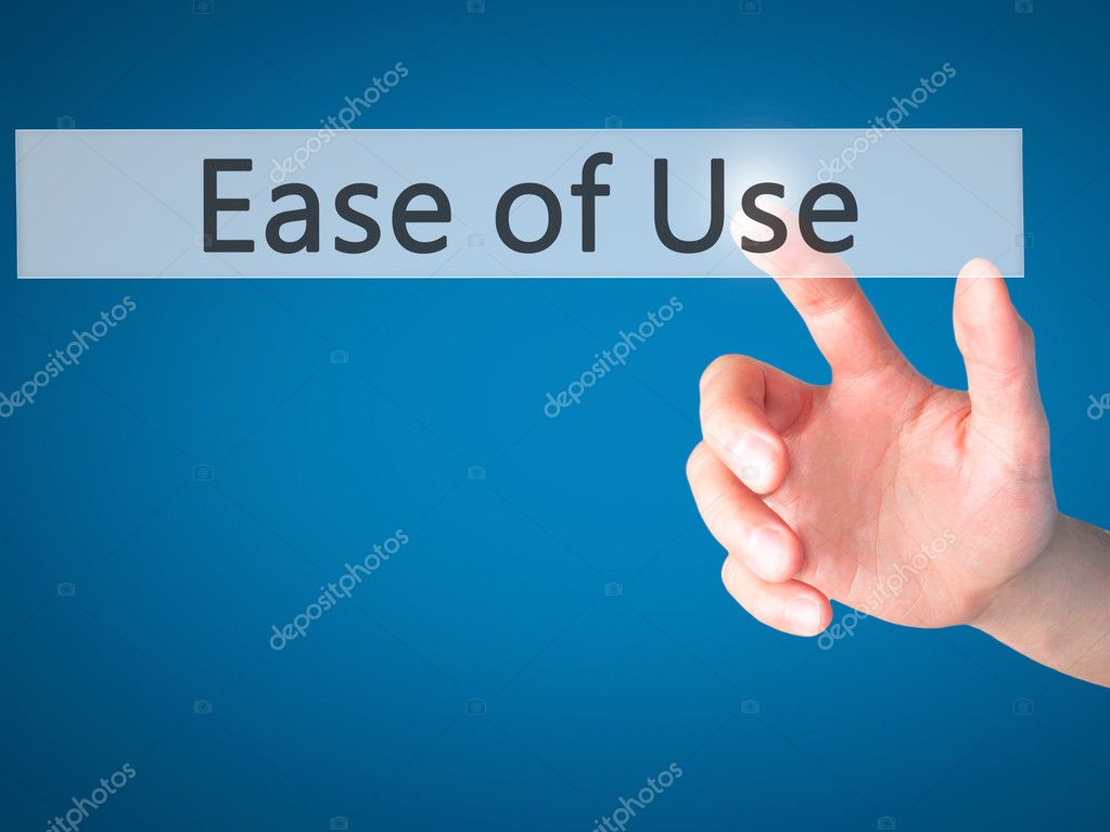 Ease of Use - Hand pressing a button on blurred background conce Stock ...