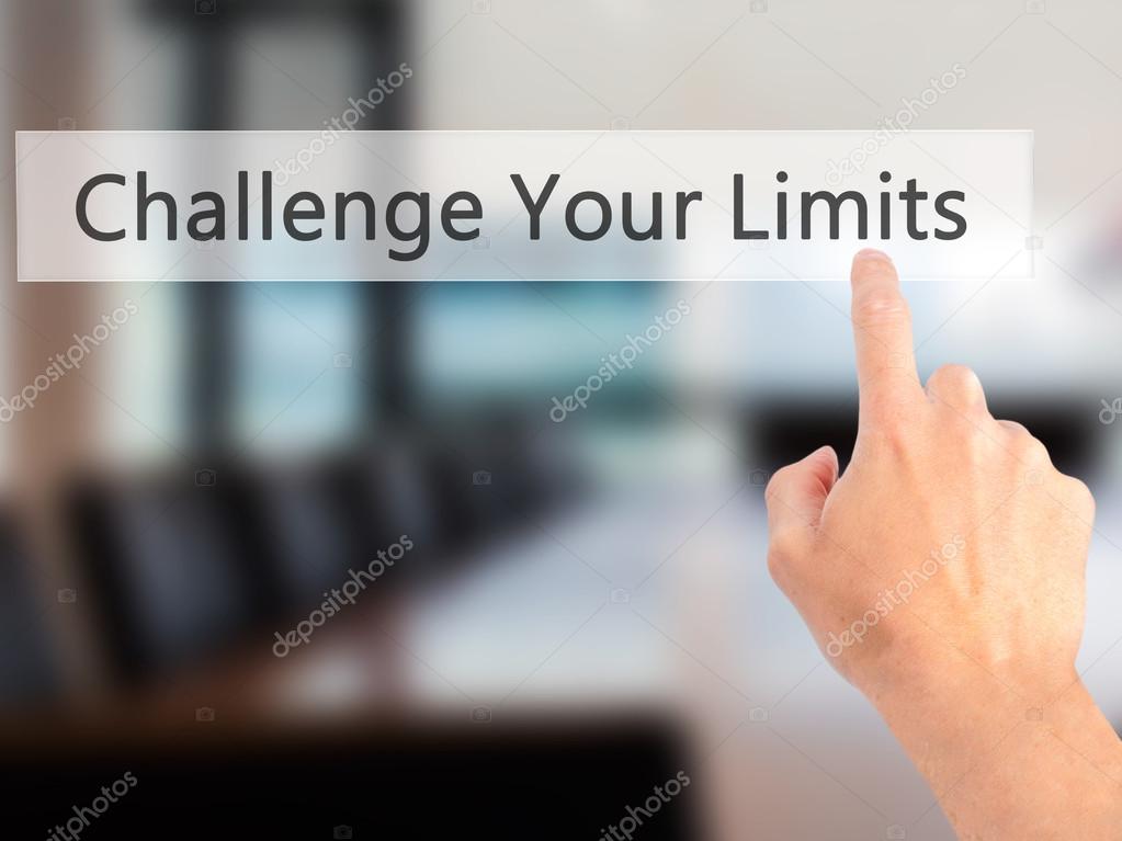 Challenge Your Limits - Hand pressing a button on blurred backgr Stock ...