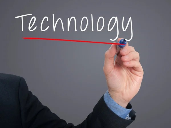 Businessman hand writing technology in the air - Stock image - Stock ...