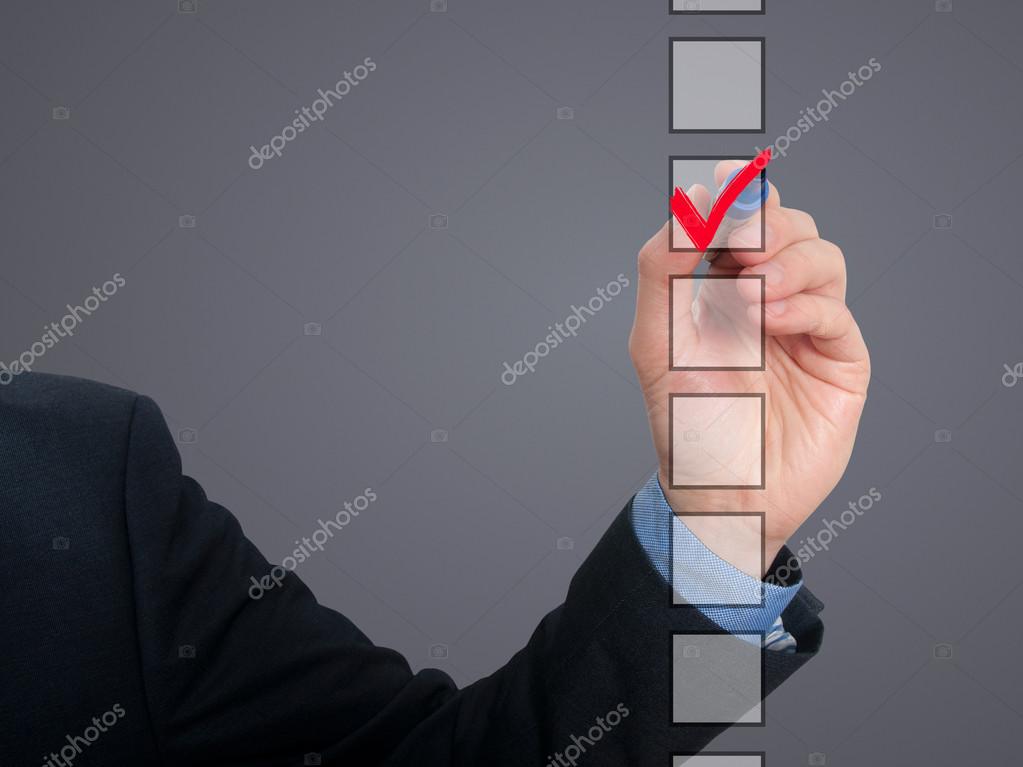 Businessman ticks off in in a square. Task list concept. Isolated on ...