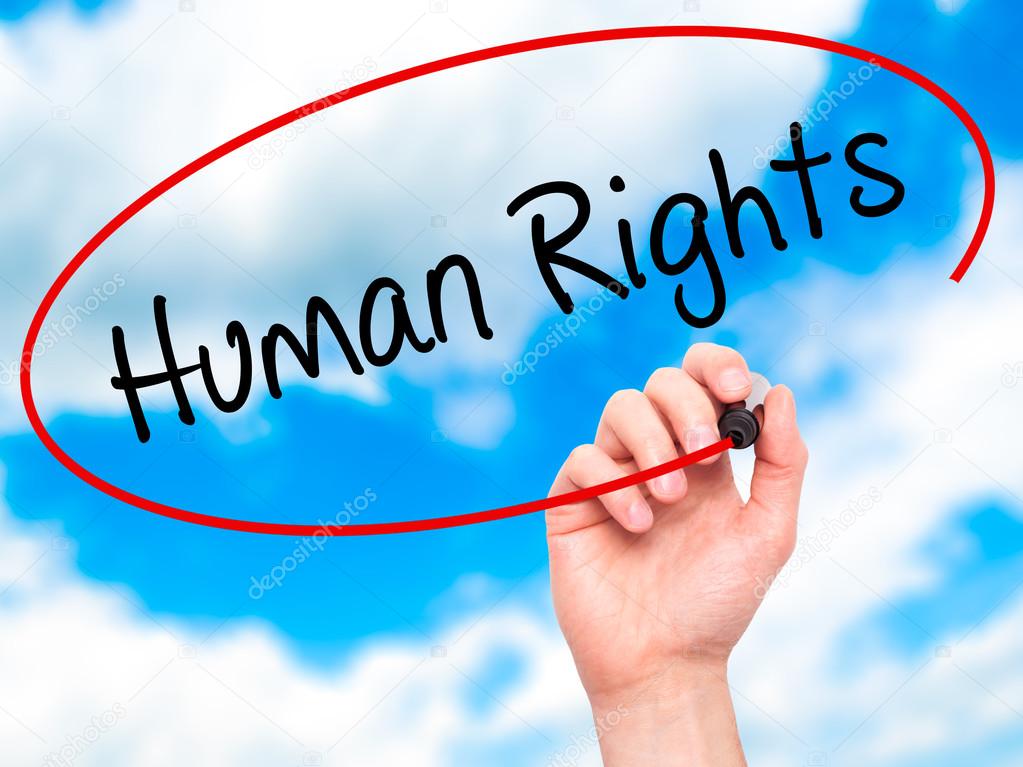 Man Hand writing Human Rights with black marker on visual screen ...